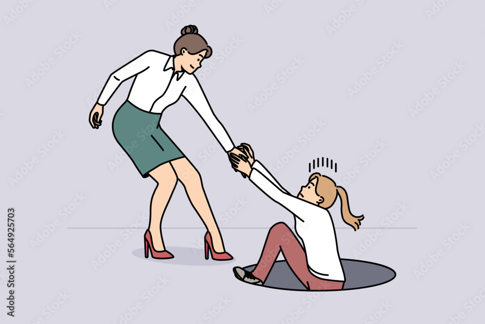 Businesswoman give hand to colleague in need rescue female employee ...