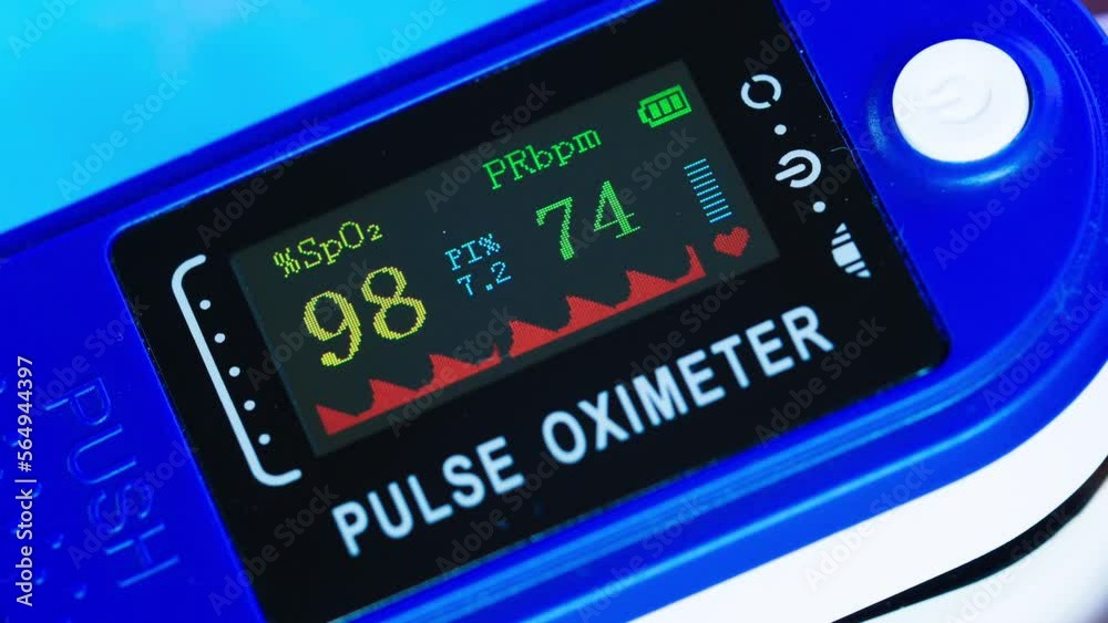 Fingertip pulse oximeter. Monitor of medical device measures the ...