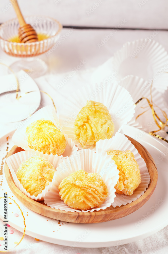 Fried cream puffs filled with chantilly cream- Brighelle typical sweet ...