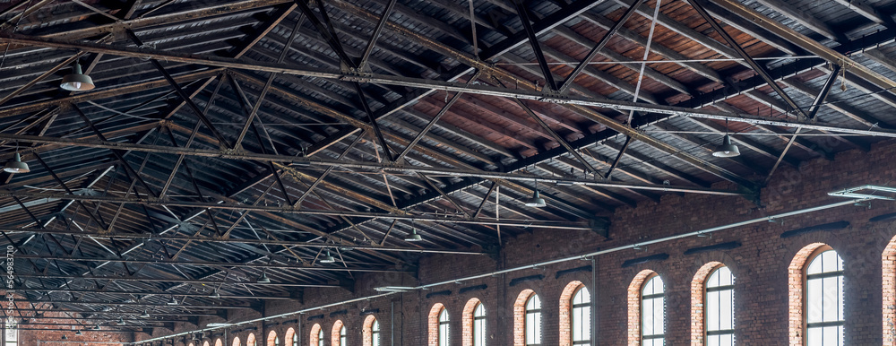 Gable roof truss of a large, vintage factory hall. Roofing construction ...
