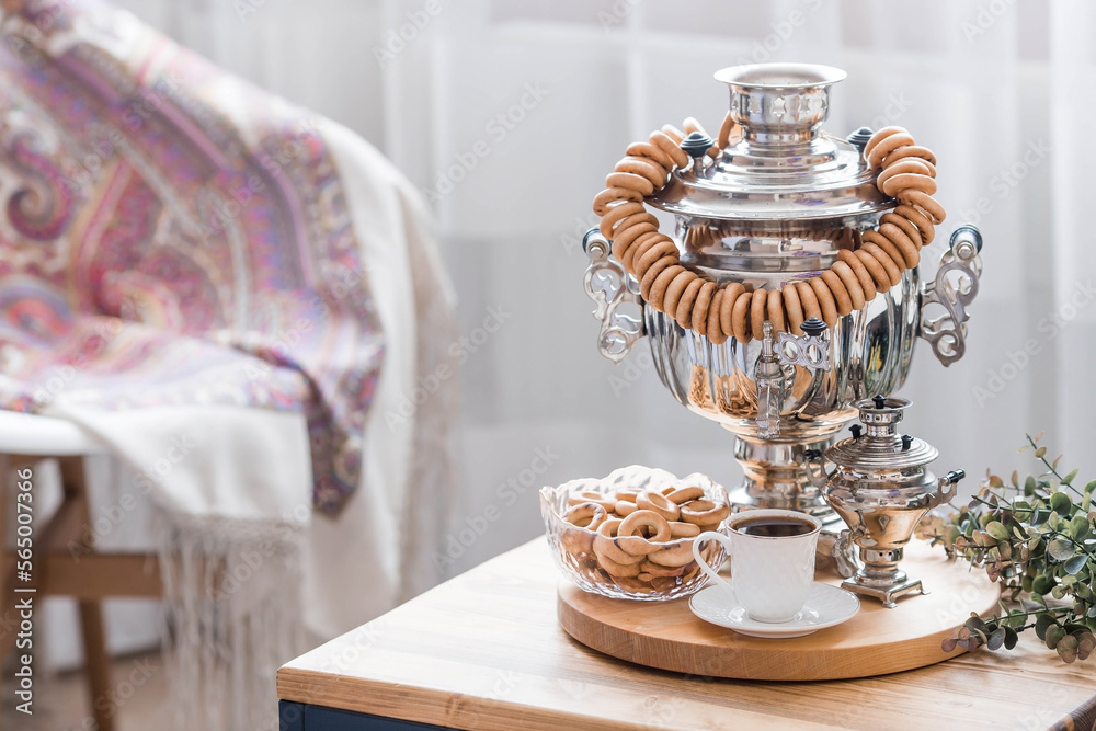 Russian traditions. Tea drinking with a samovar. Still life with bagels ...