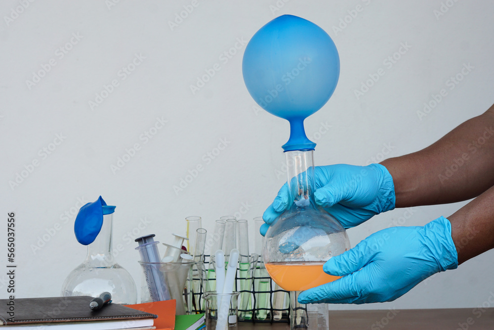 Student do science experiment, lab lesson, transparent bottles with ...