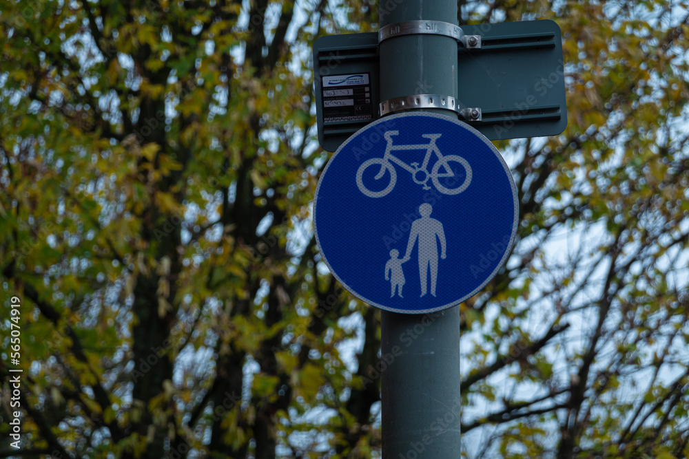 Cyclist and pedestrian road signs are installed on the roads. Stock ...