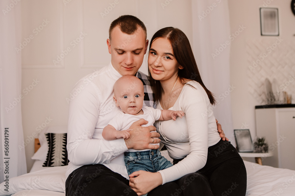 Little boy pop-eyed surprised cute child baby playing with parents ...