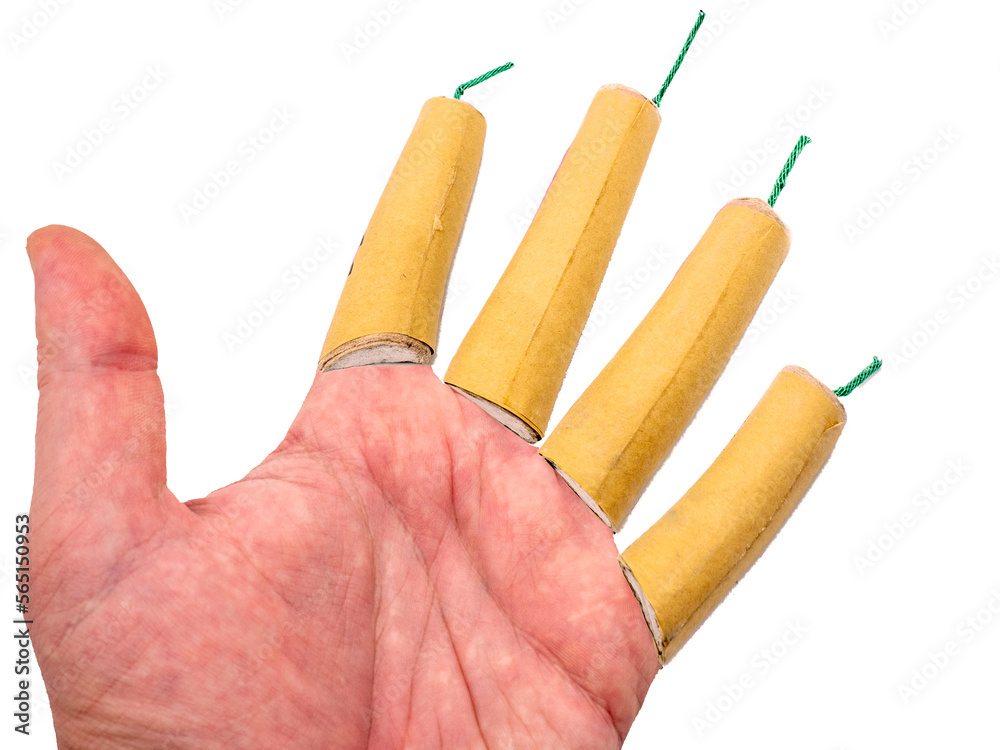 hand with firecrackers as fingers, conceptual photo of danger of using ...