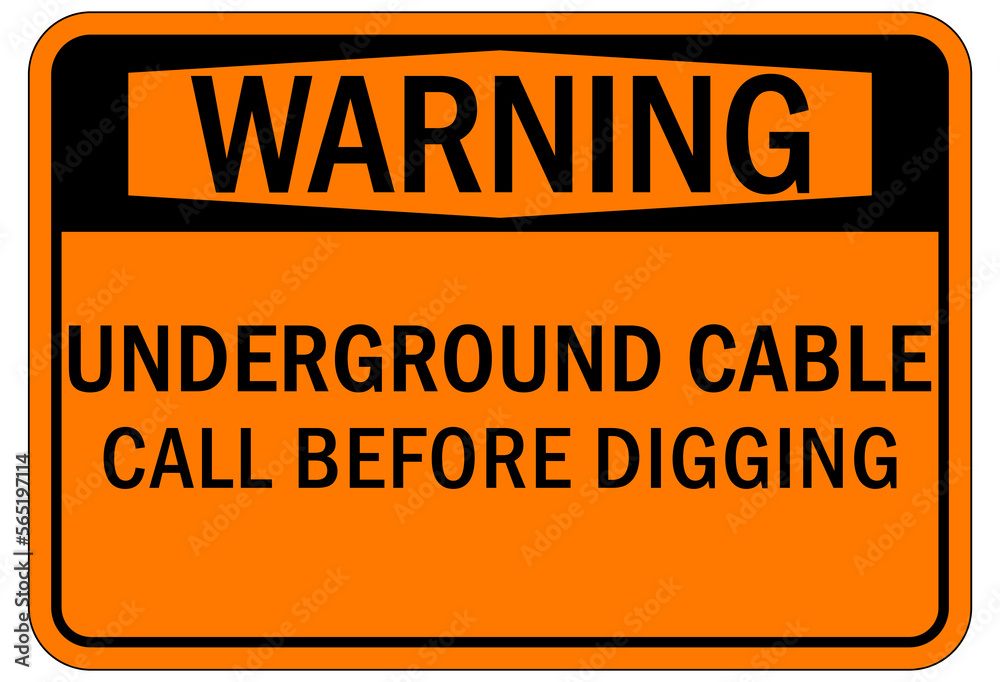 Electrical utility sign and labels underground cable call before ...