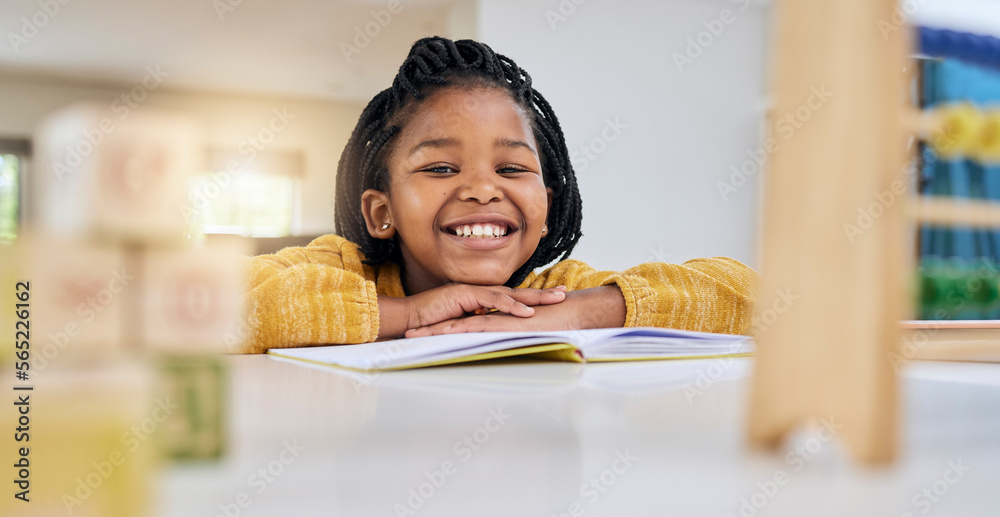 Education, child and girl writing at table for homework, lesson and ...