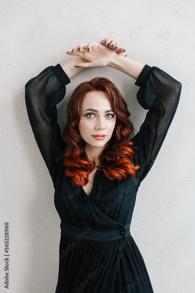 Stylish beautiful photo session in a photo studio of a luxurious couple ...