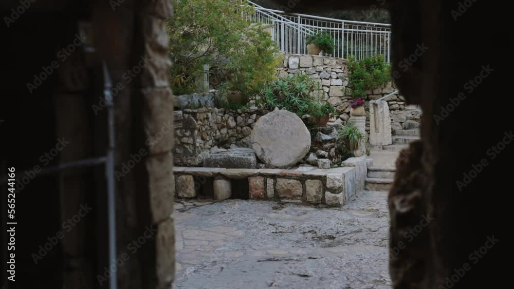 Camera looking out of Jesus Tomb in Jerusalem Tomb stone christ risen ...
