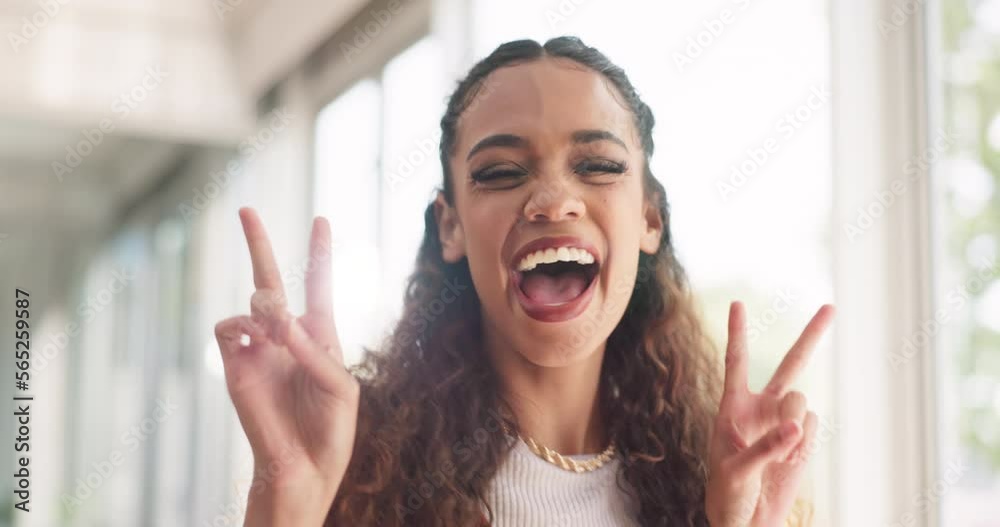 Success, face and creative woman with a peace sign walking in the ...