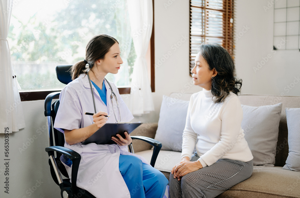medical doctor holing patient's hands and comforting her.Kind doctor ...