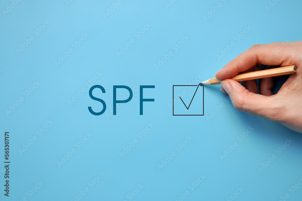 Word: SPF and a checkmark next to it. Sun protection symbol Stock Photo ...