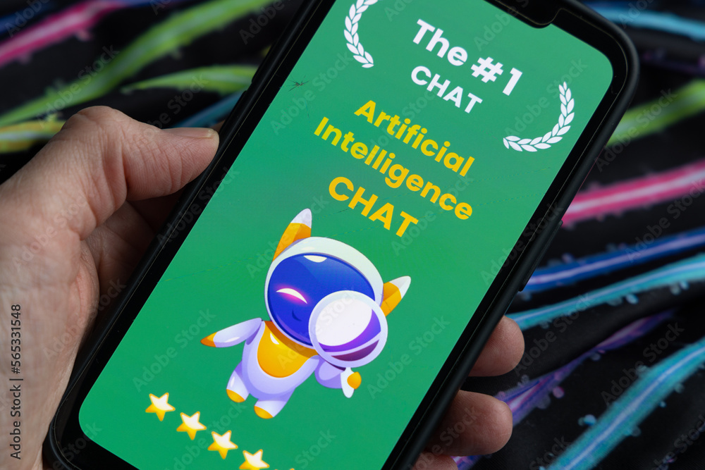 Woman's hand holding an iPhone with appstore and ChatGPT and Chat bot ...