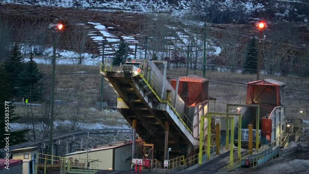 A Close-Up of Bulk Material Discharge: A Semi Truck Unloads Wood ...