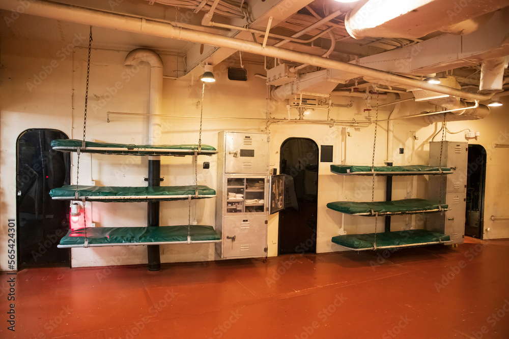 Inside of the USS Alabama Battleship with green stacked bunk beds at ...