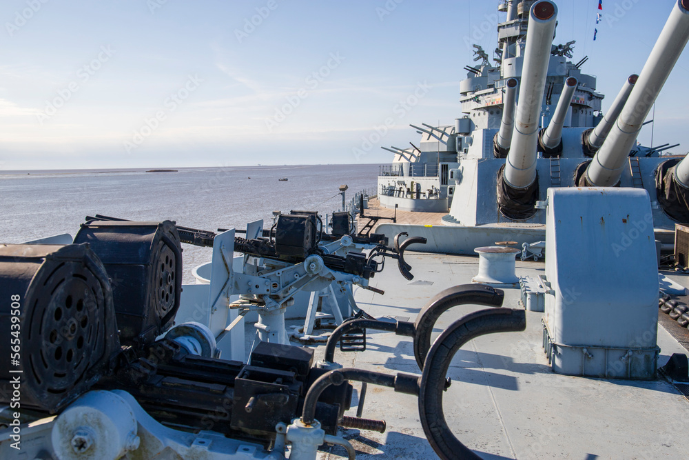 Along the bow of the USS Alabama with black anchor chains, 20 MM AA ...