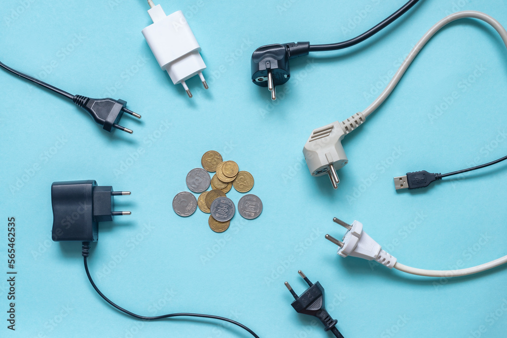 Rising electricity prices. Plug plugs and Ukrainian coins. Energy ...
