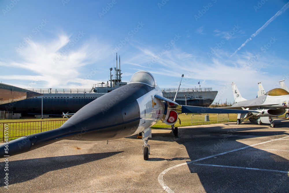 A black and white military fighter jet and a gorgeous blue sky at USS ...
