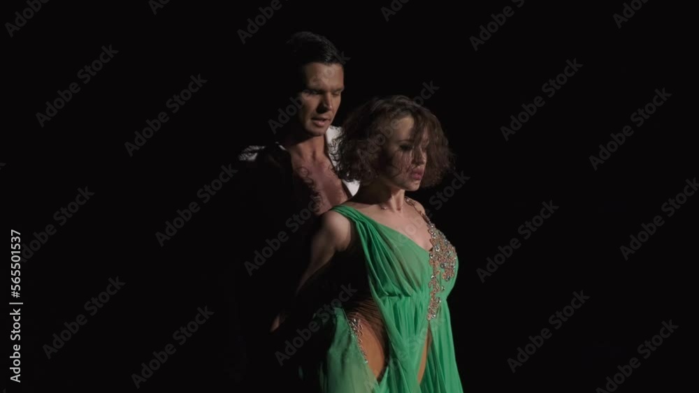 Partner turns girl to Rumba Shadow Position and rounding right arm ...