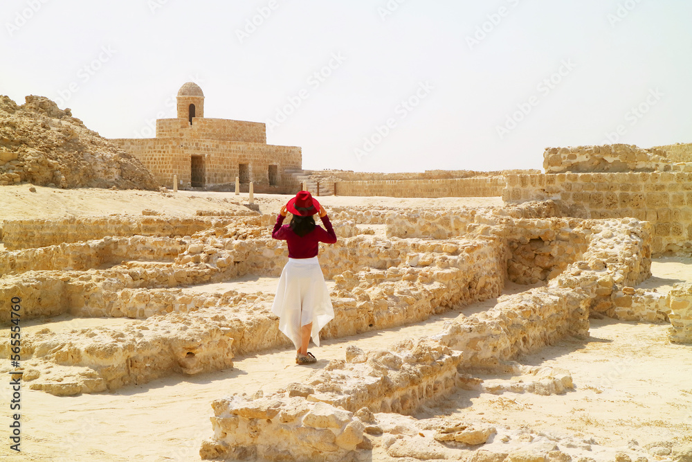 Female Visiting the Remains of the Bahrain Fort, the Ancient Harbour ...