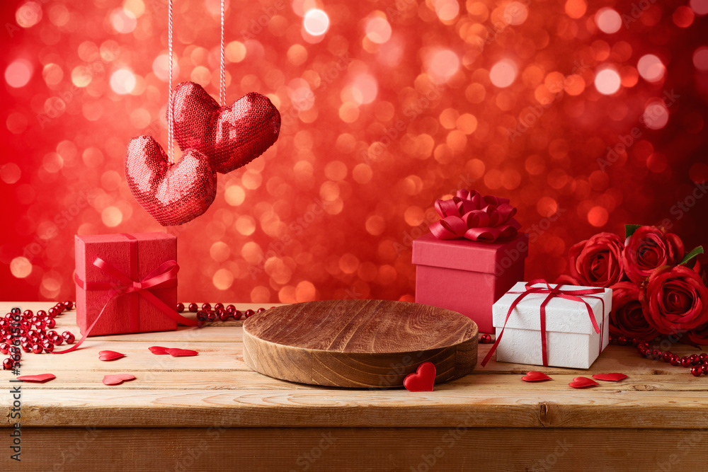Valentines day background with wooden podium, gift box and heart shapes ...