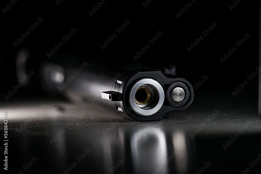 Crime scene, gun on the table with very little light Stock Photo ...