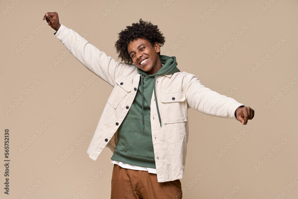 Young happy funky African American teen boy having fun isolated on ...