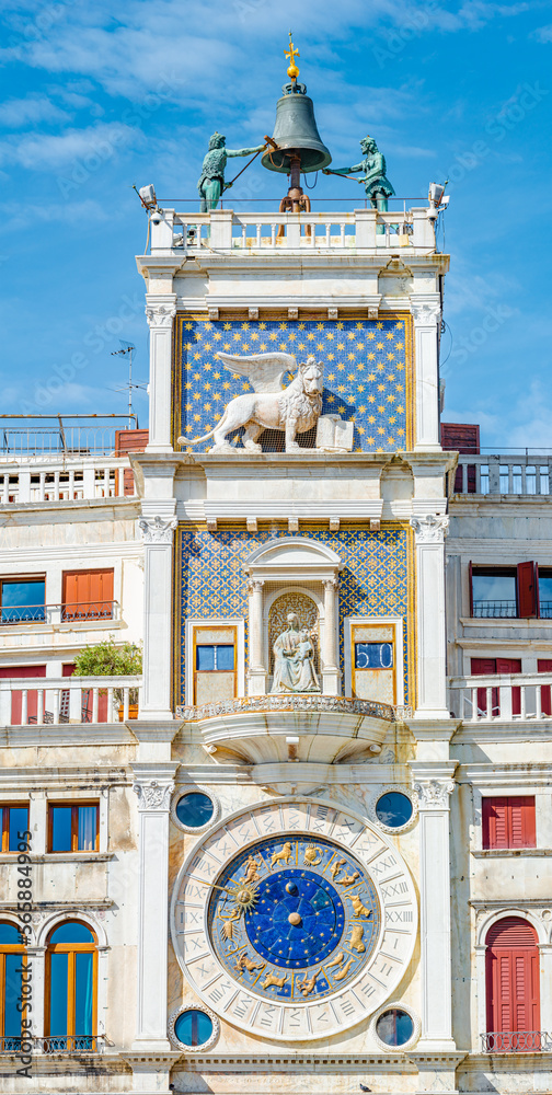 Famous clock and bell Tower with a top big bell and dickens, winged ...