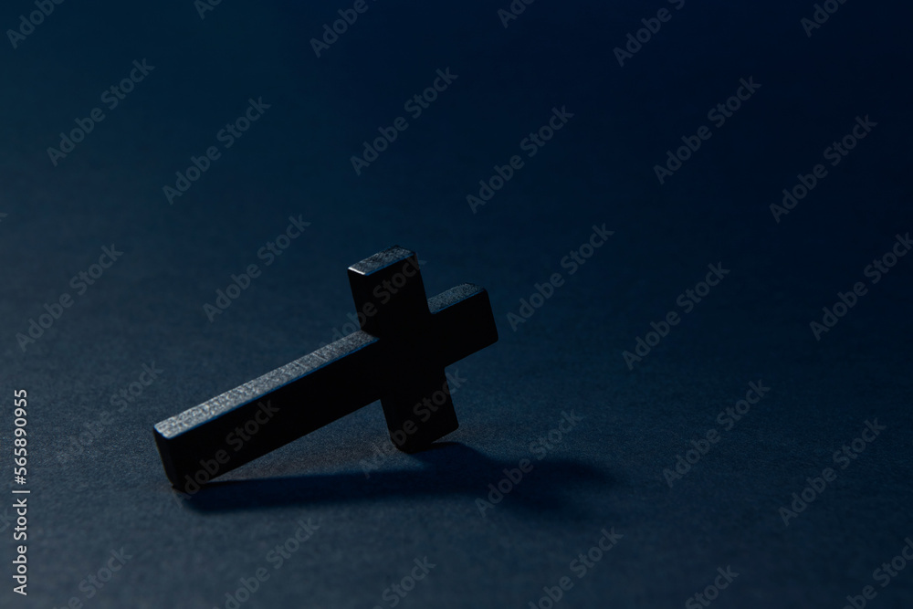 Photo & Art Print Black wooden traditional cross fallen down and lying ...