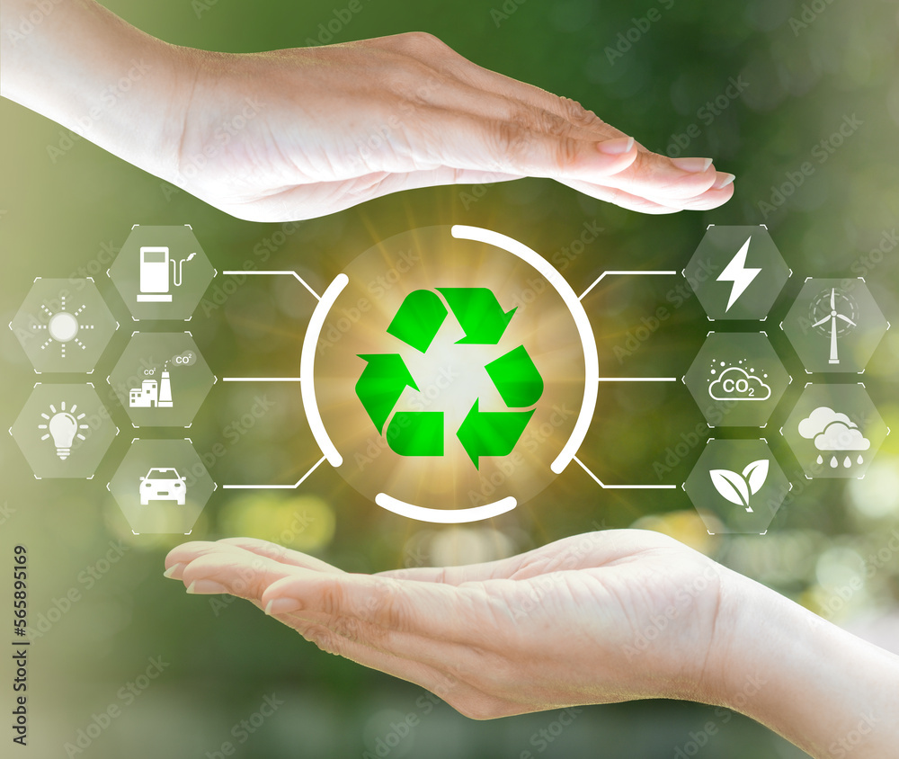 circular economy symbol on hand, Energy consumption and CO2 emissions ...