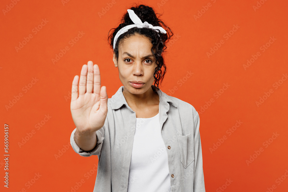 Young sad strict angry woman of African American ethnicity she wears ...