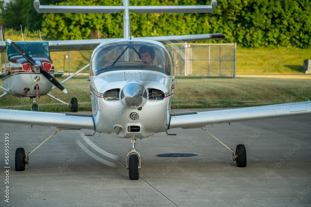 Small airplane on the ground Stock Photo | Adobe Stock