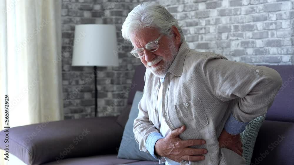 Upset senior elder man feel sudden back pain muscles ache tension ...