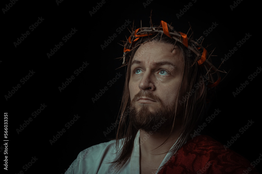 Jesus Christ wearing a crown of thorns and white chiton toga mantle ...