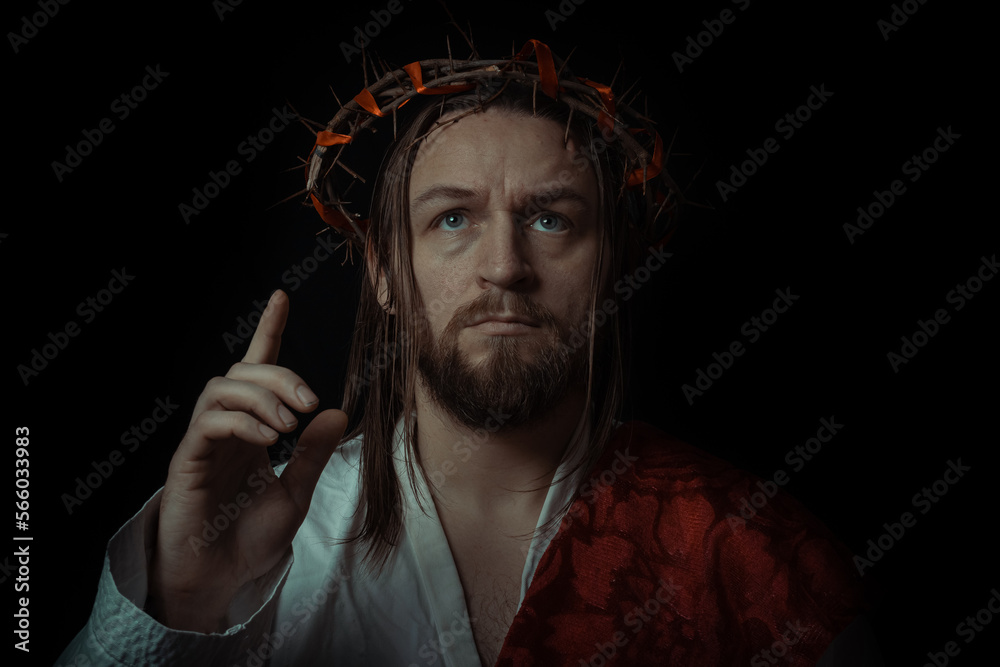 Jesus Christ wearing a crown of thorns and white chiton toga mantle ...