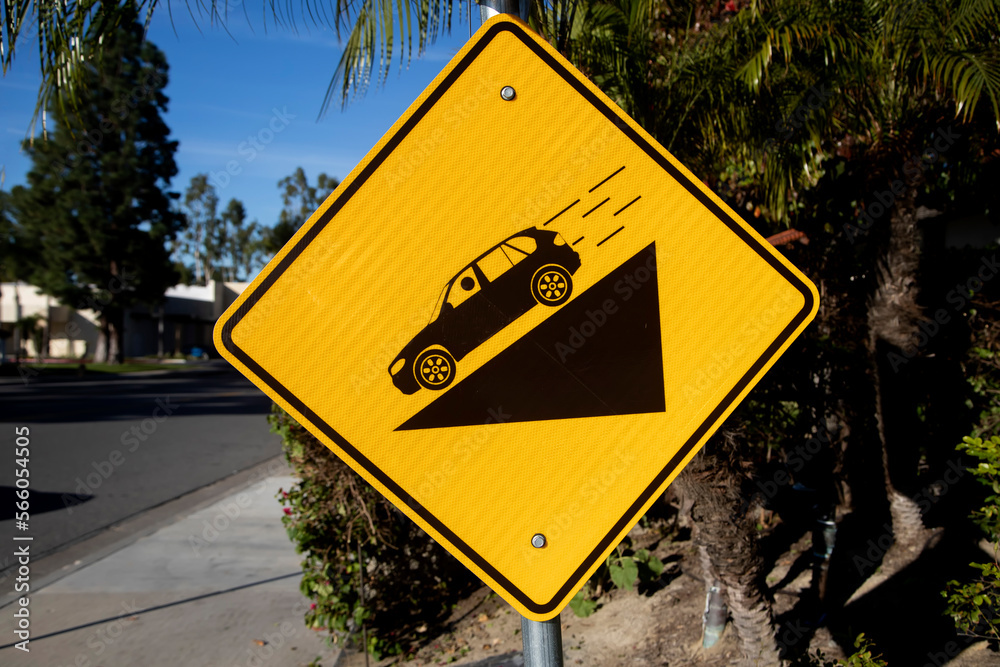 Yellow sign with graphic indicating a very steep slope Stock Photo ...