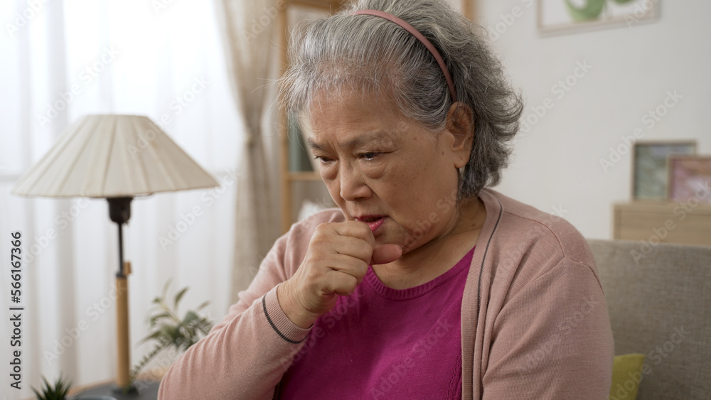 closeup view of an unwell asian grandma getting lung infection is ...