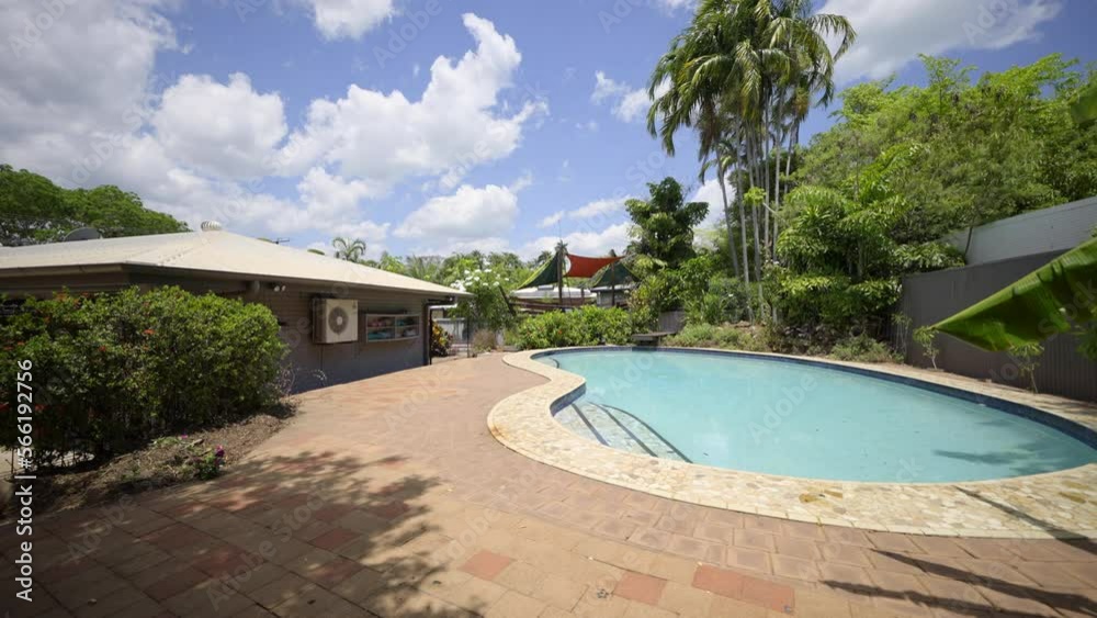 Concrete tiled patio veranda outdoor area. Luxurious pool coping edging ...