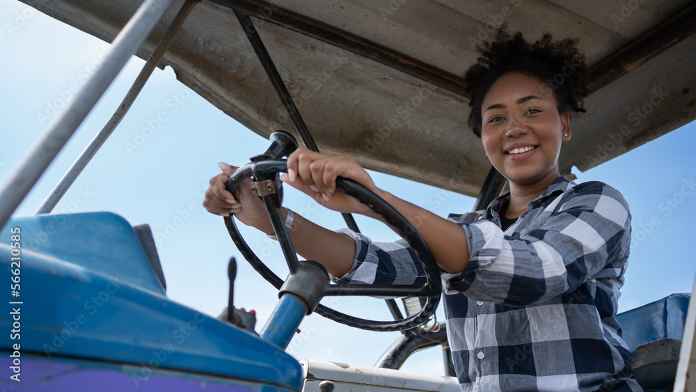 Female Farmer On Tractor