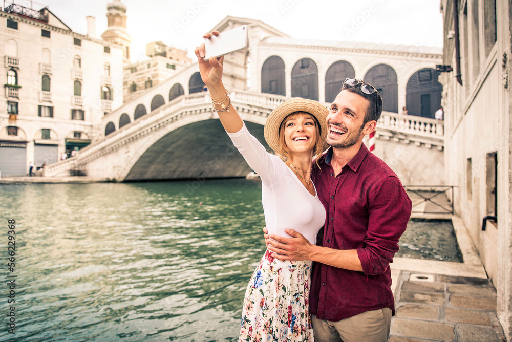 Romantic young couple enjoying vacation in Venice, Italy Stock Photo ...