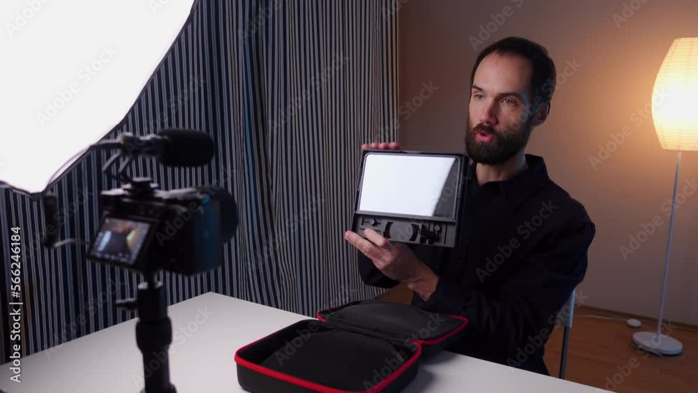Excited male content creator sharing feedback on teleprompter filming ...