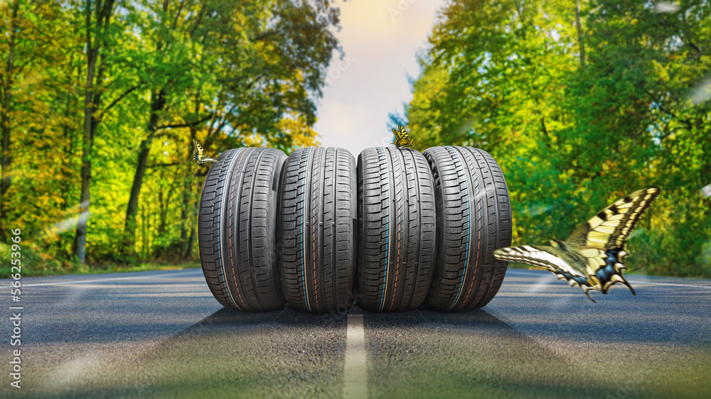Foto de summer tires on the asphalt road in the sun - time for summer ...