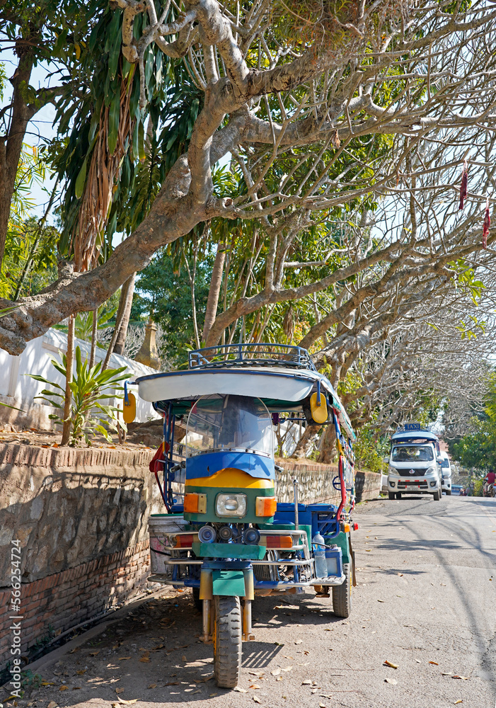 Colorful tuk-tuk in the street in Luang Prabang, Laos Stock Photo ... Colorful tuk-tuk in the street in Luang Prabang, Laos Stock Photo ...