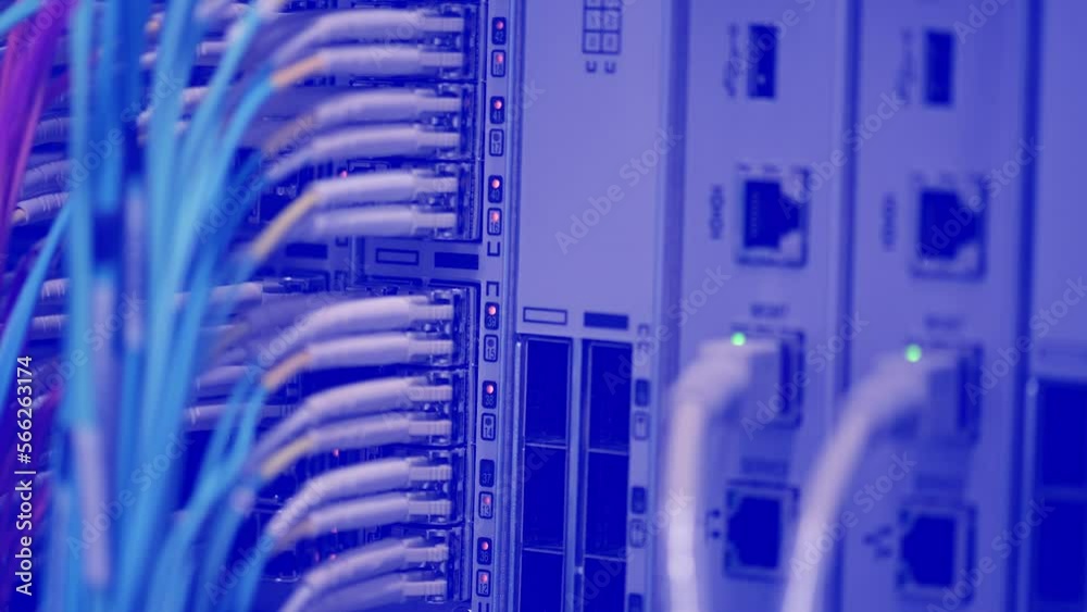 blinking LED lights in a server rack with RJ45 and fiber optic cable ...