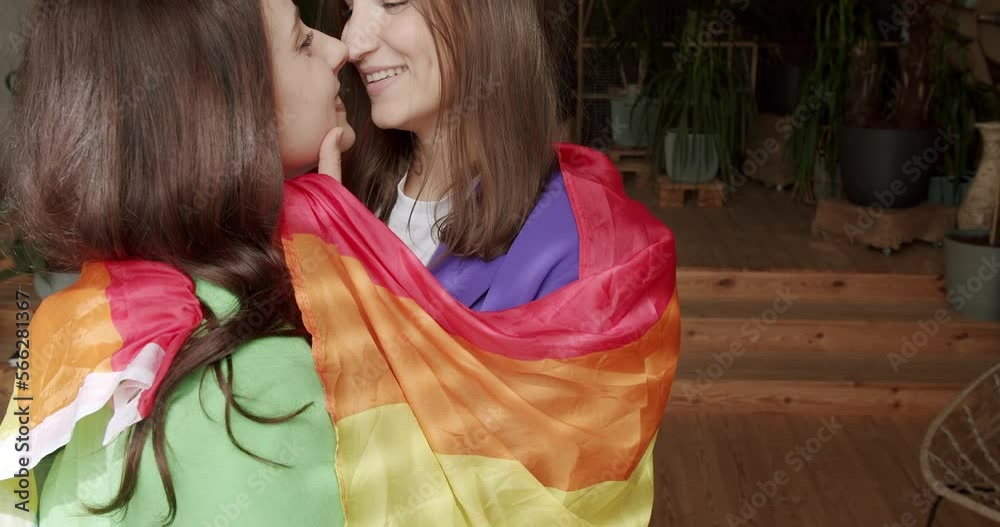 Lgbt women couple rest at home. Embrace and holding each other with ...