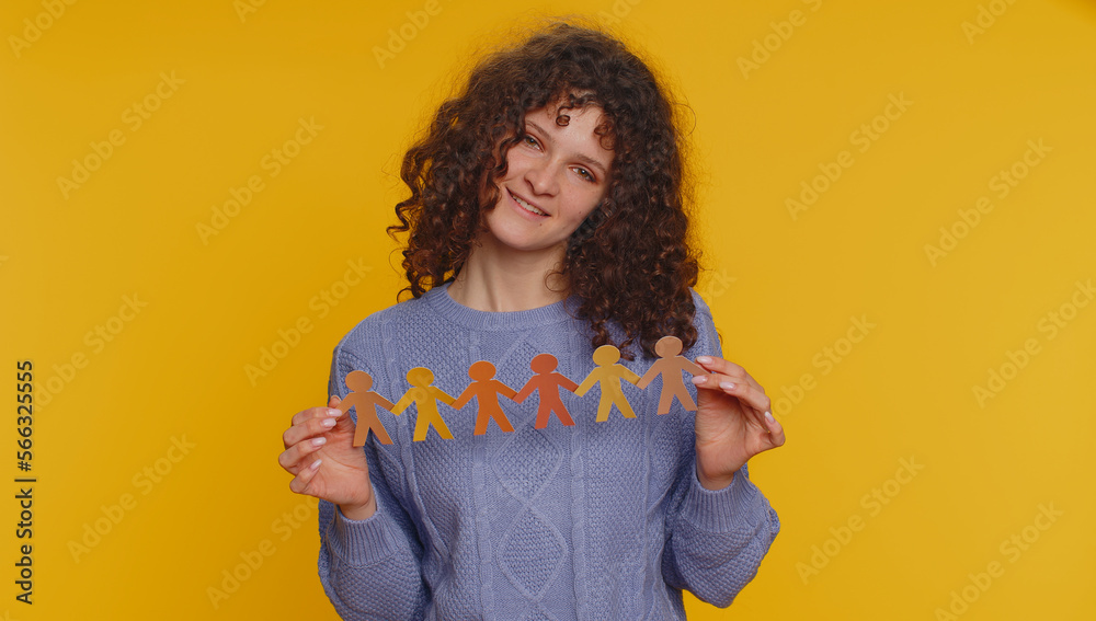 Woman showing multiracial different skin color human shape cut out of ...