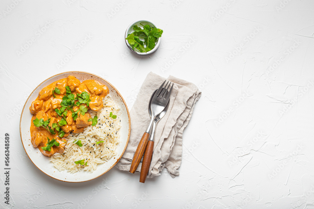 Traditional Indian dish chicken curry with basmati rice and fresh ...