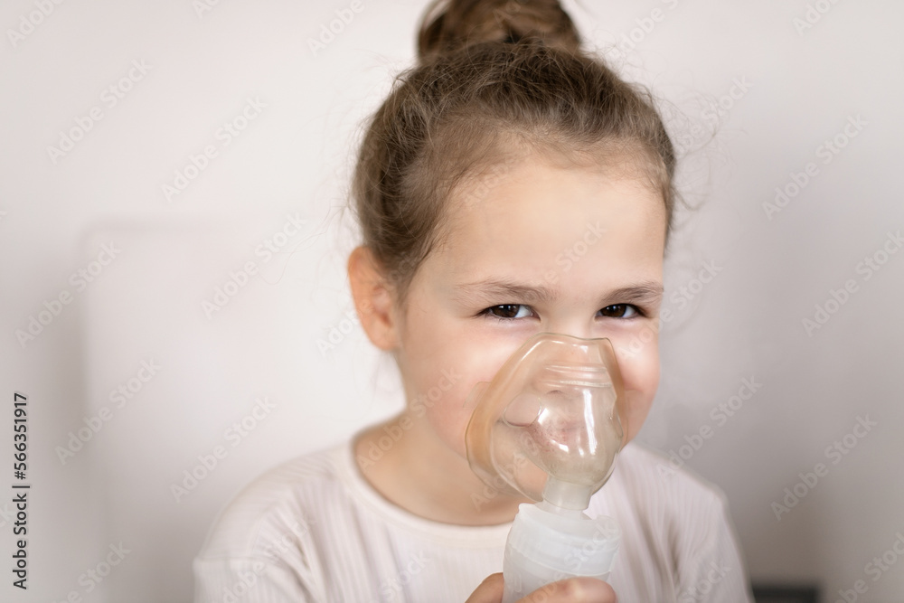 inhalation, aerosol, a 6-year-old girl does inhalation. the child does ...