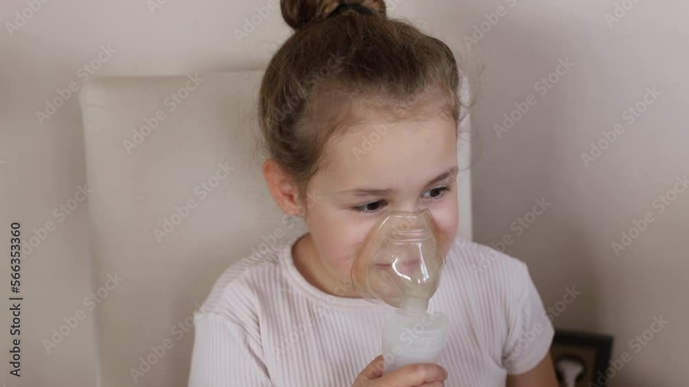 inhalation, aerosol, a 6-year-old girl does inhalation. the child does ...