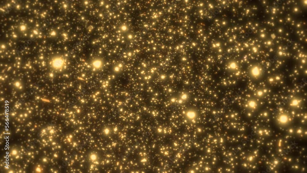 Gold particles floating upwards. 4K abstract motion background of ...